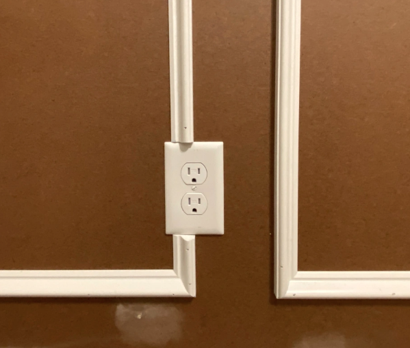 Picture Frame Molding: How to Install Around a Light Switch or Outlet